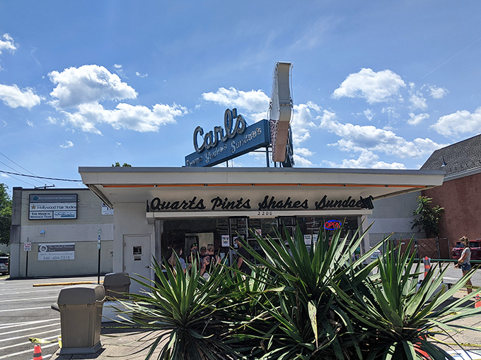 The iconic Art Deco fa&ccedil;ade of Carl's stands like a beacon of frozen delight against the Virginia sky. Some buildings just scream "summer memories inside!"