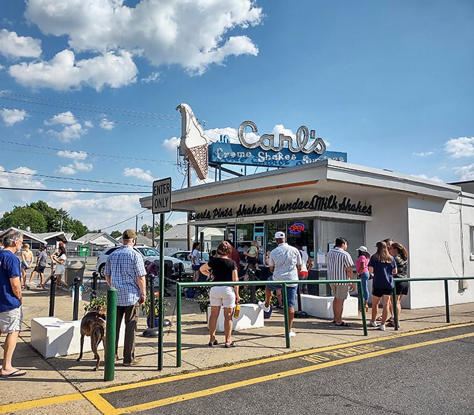The iconic Art Deco fa&ccedil;ade of Carl's stands like a beacon of frozen delight against the Virginia sky. Some buildings just scream "summer memories inside!"