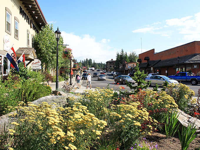 Historic charm meets mountain wilderness on McCall's main street, where brick buildings and wooden awnings create the perfect backdrop for treasure hunting.