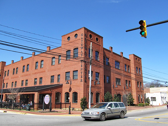 Historic brick buildings line Hillsborough's downtown, where arched windows and classic storefronts create a timeless shopping backdrop that practically begs for exploration.