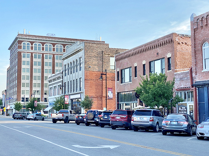 Downtown Bartlesville's historic brick buildings stand like sentinels of a bygone era, where oil money met prairie ambition.