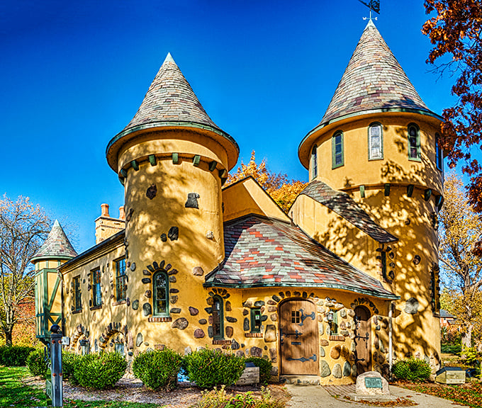 Curwood Castle's fairy-tale turrets and butter-yellow walls make it look like someone dropped a slice of medieval Europe into the Michigan countryside.