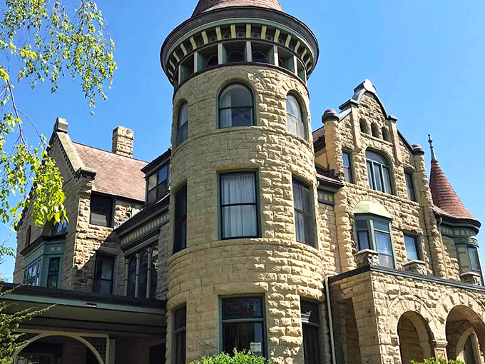 Straight out of a fairy tale, this sandstone fortress with its commanding turret proves Wisconsin can do medieval grandeur without the inconvenience of actual knights storming the gates.