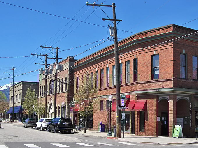 Historic brick buildings stand sentinel in downtown Sandpoint, where your Social Security check stretches further than your last attempt at yoga.