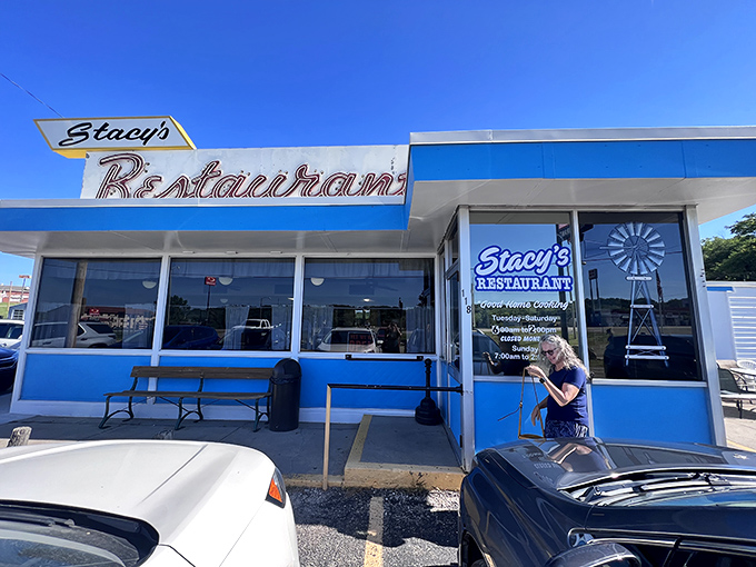 The classic neon sign beckons like an old friend. Stacy's Restaurant stands proudly against the Kansas sky, promising comfort and nostalgia with every meal.