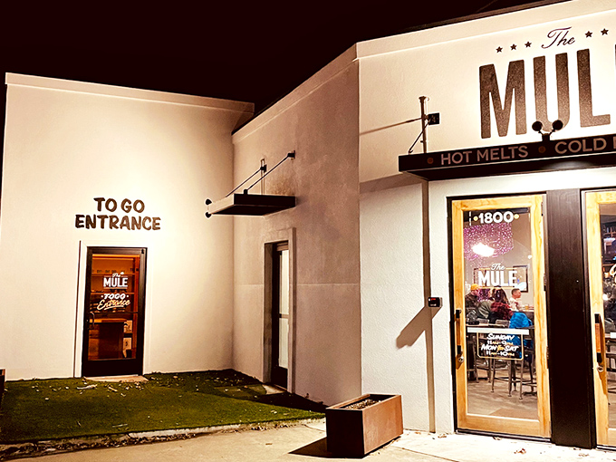 The unassuming exterior of The Mule belies the culinary treasures within. Like finding a diamond in a plain wrapper, this Oklahoma City gem promises "HOT MELTS • COLD BEER" — and delivers spectacularly.