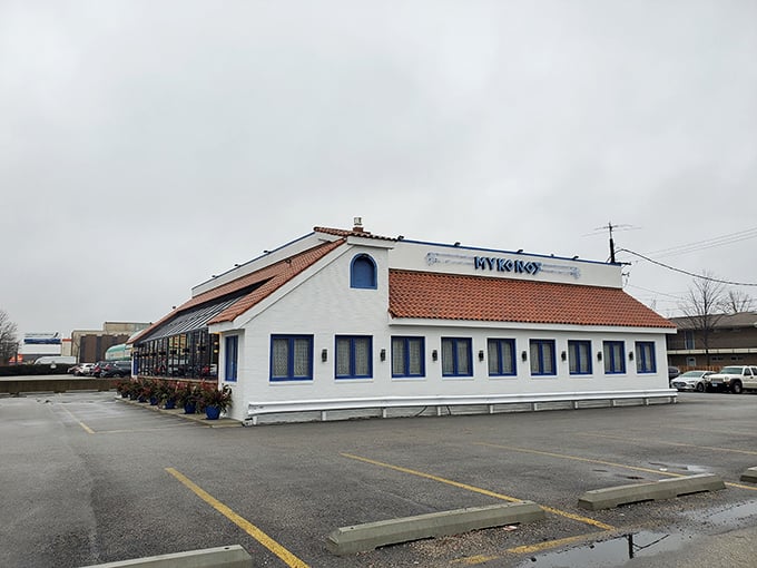 The white-washed exterior with blue trim makes Mykonos stand out in Niles like a Mediterranean postcard come to life. Greek island vibes without the airfare!