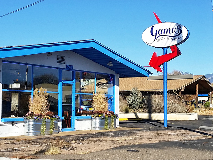 The blue-trimmed exterior of Yamas stands out like a Mediterranean oasis in Santa Fe, complete with that can't-miss red arrow guiding hungry travelers home.