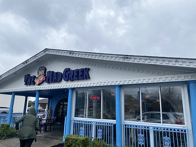 The blue-trimmed facade of The Mad Greek stands like a cheerful Santorini postcard dropped into Columbus. Greek hospitality awaits!