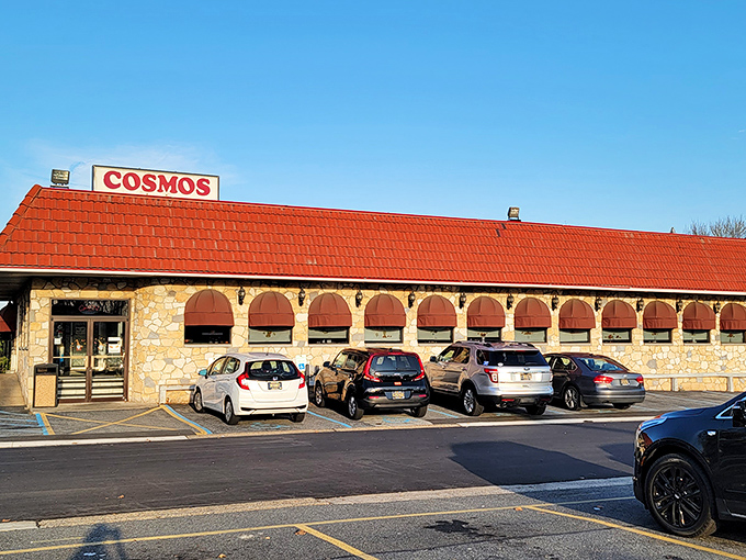 The distinctive red roof and stone facade of Cosmos Restaurant & Bar stands as a Wilmington landmark, promising Greek-American comfort food that delivers on nostalgia and flavor.
