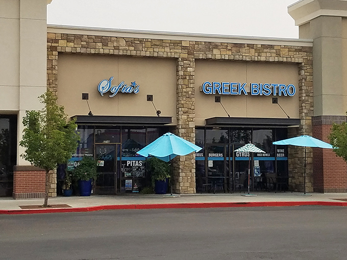 Sofia's Greek Bistro welcomes hungry travelers with its stone facade and bright blue umbrellas&mdash;a little slice of Santorini in suburban Garden City.