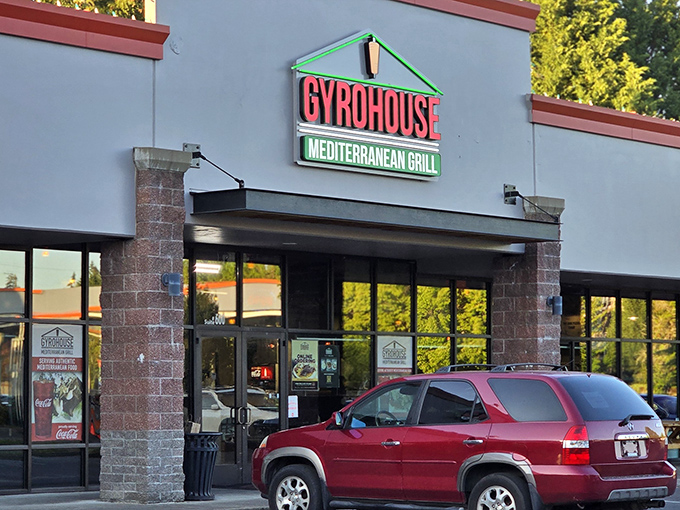 The unassuming storefront of Gyro House Mediterranean Grill stands like a beacon of flavor in Beaverton's retail landscape. Mediterranean magic awaits inside. 