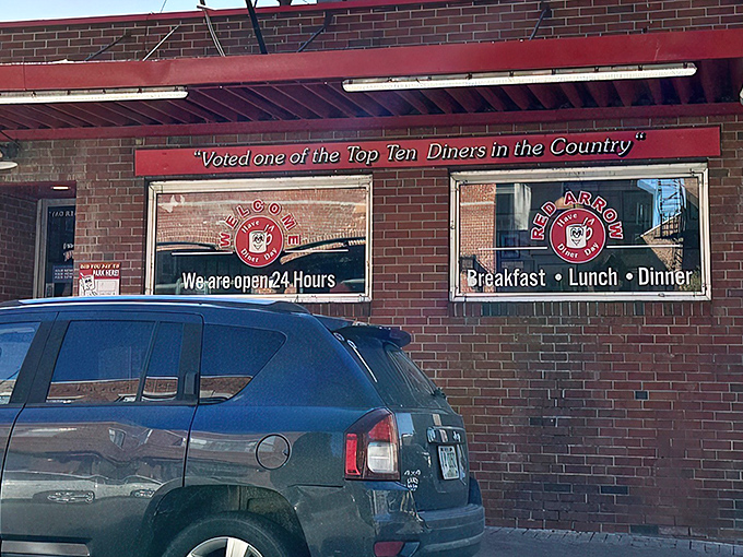 The iconic brick exterior of Red Arrow Diner proudly announces its status as a top-ten diner. Manchester's 24-hour beacon of breakfast bliss awaits hungry travelers.