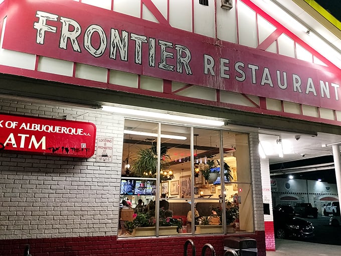 The iconic red and white facade of Frontier Restaurant stands as an Albuquerque landmark, beckoning hungry travelers with promises of New Mexican comfort food.