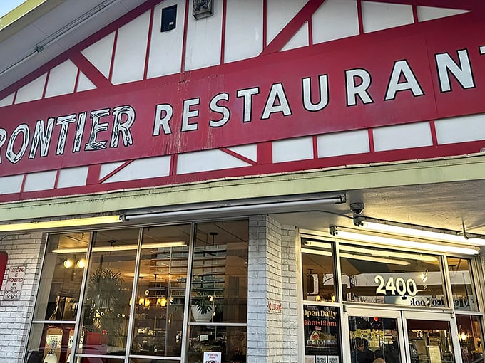 The iconic red and white facade of Frontier Restaurant stands as an Albuquerque landmark, beckoning hungry travelers with promises of New Mexican comfort food.