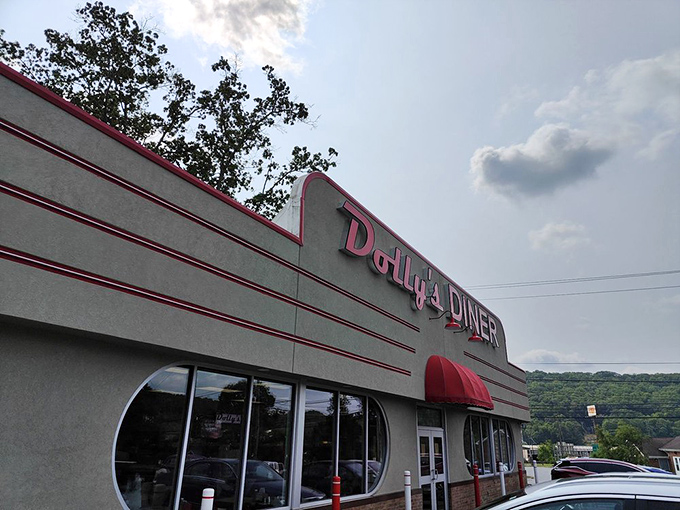 The classic red signage of Dolly's Diner beckons like a lighthouse for the breakfast-starved. This retro exterior promises comfort food without pretension.