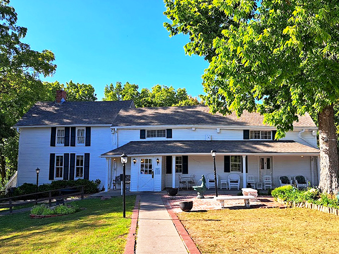 The unassuming white farmhouse exterior of Stroud's hides culinary greatness within, like finding a Picasso at a yard sale.