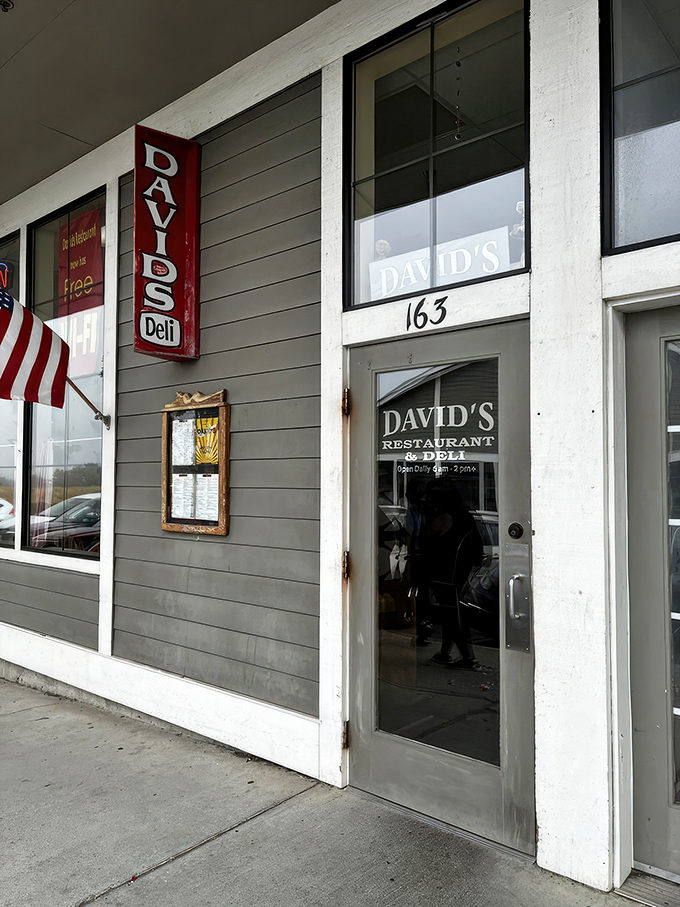 The unassuming storefront that launches a thousand breakfast dreams. American flag proudly waving, as if announcing: "Patriotism and pancakes served here!"