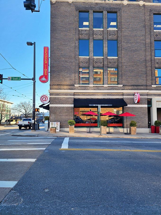 The iconic @ symbol beckons from this brick corner spot in downtown Little Rock, promising modern diner delights with a side of urban charm.