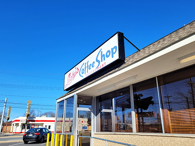 The iconic Lucky's sign welcomes you like an old friend, promising comfort food and conversations that'll make your morning shine.