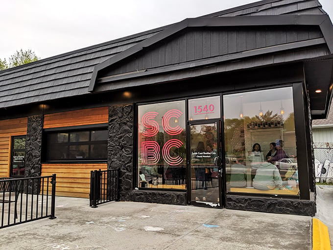 The neon glow of SCBC beckons breakfast enthusiasts like a pink lighthouse guiding hungry sailors to shore. Modern meets cozy in this distinctive Omaha storefront.