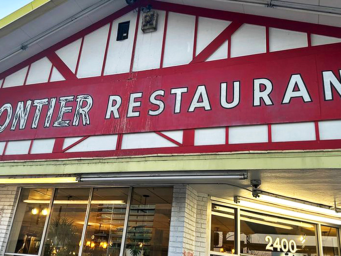 The iconic red-and-white facade of Frontier Restaurant stands as Albuquerque's culinary lighthouse, beckoning hungry souls from Central Avenue.