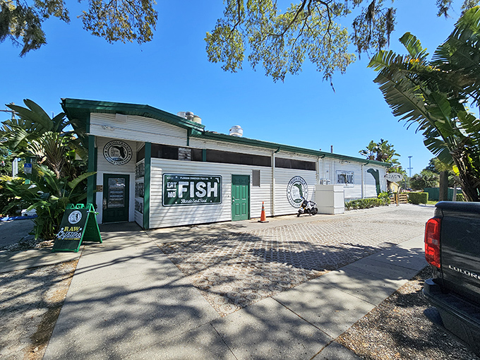 Old Florida charm meets seafood paradise at this unassuming white building with green trim. Palm fronds wave hello as if they know what deliciousness awaits inside.