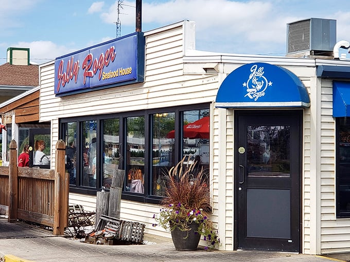 The unassuming exterior of Jolly Roger Seafood House—proof that the best treasures often hide behind the most modest facades. Lake Erie's culinary pirate ship awaits!