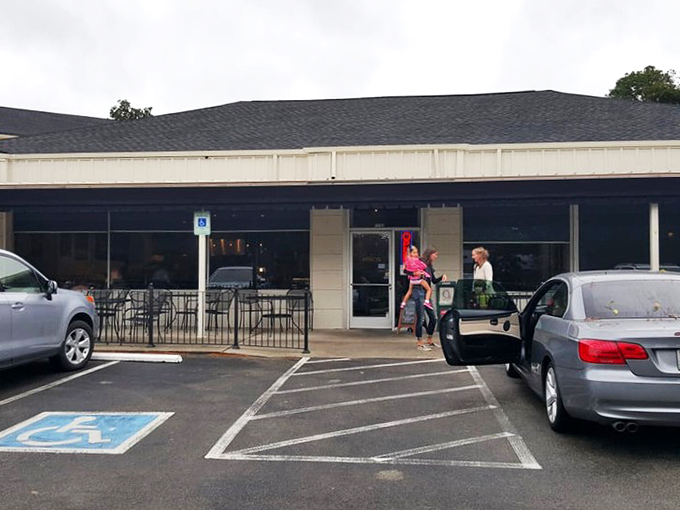 The unassuming exterior of The Plaid Apron belies the culinary magic happening inside. Like finding a secret clubhouse for breakfast enthusiasts.