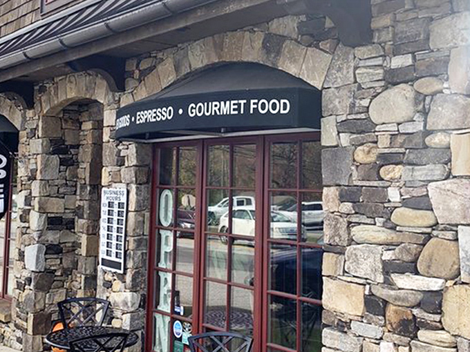 Storybook charm meets serious coffee credentials at White Birch Provisions. The stone-and-cedar shake exterior with those whimsical round windows practically whispers, "Come inside, the coffee's extraordinary."