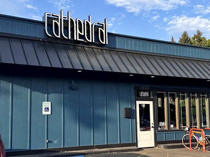 The blue-trimmed storefront with its glowing "OPEN" sign isn't just inviting—it's practically whispering sweet caffeinated promises to passersby.