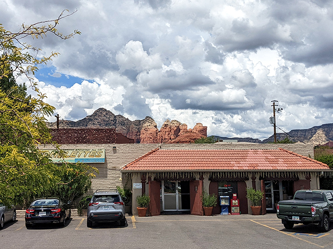 The red-roofed sanctuary of breakfast dreams stands proudly against Sedona's iconic red rocks, promising morning salvation for hungry travelers.