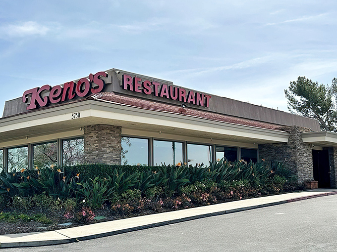 The unassuming stone facade of Keno's Restaurant stands like a culinary fortress, promising comfort food treasures within its humble walls.