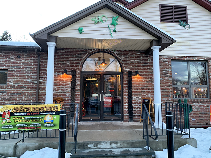 The charming brick-and-siding exterior of Se&ntilde;or Pancho's sports a playful lizard mural, as if saying "come inside for some serious flavor fiesta!"