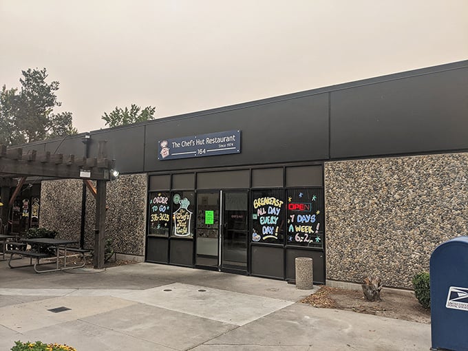 The blue storefront promises nothing fancy, but those hand-painted window signs are like treasure maps to breakfast paradise. Since 1974, this unassuming spot has been Boise's best-kept morning secret.