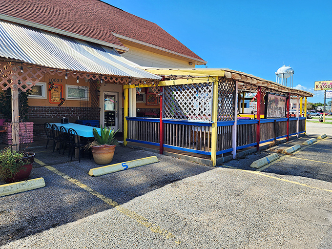 The cheerful yellow exterior of Pepe's Bosque beckons like an old friend, complete with a colorful patio that promises good times ahead. 