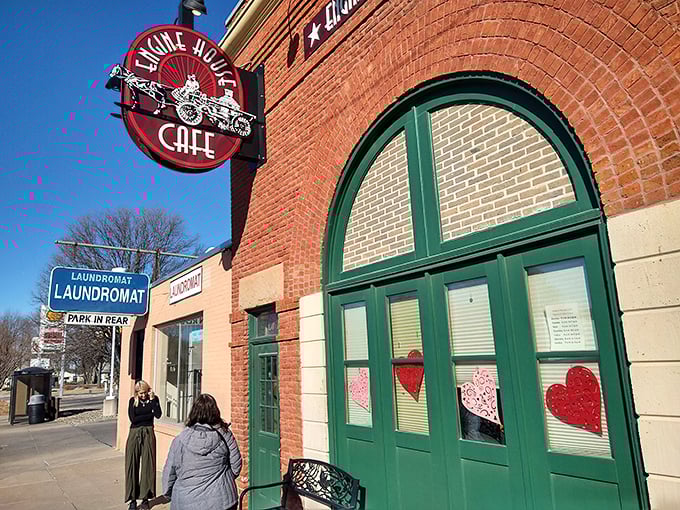 The historic brick facade of Engine House Cafe stands proudly against Nebraska's big sky, a beacon for breakfast enthusiasts and history buffs alike. 
