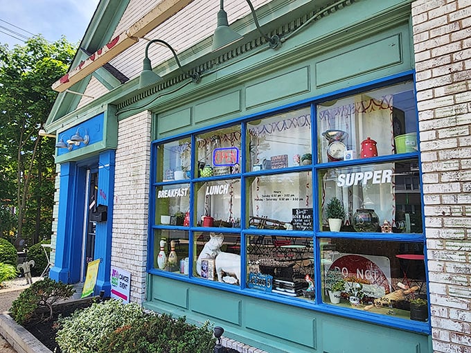 The mint-green and blue exterior of Shut Up and Eat beckons like a colorful oasis of comfort food in Toms River. 