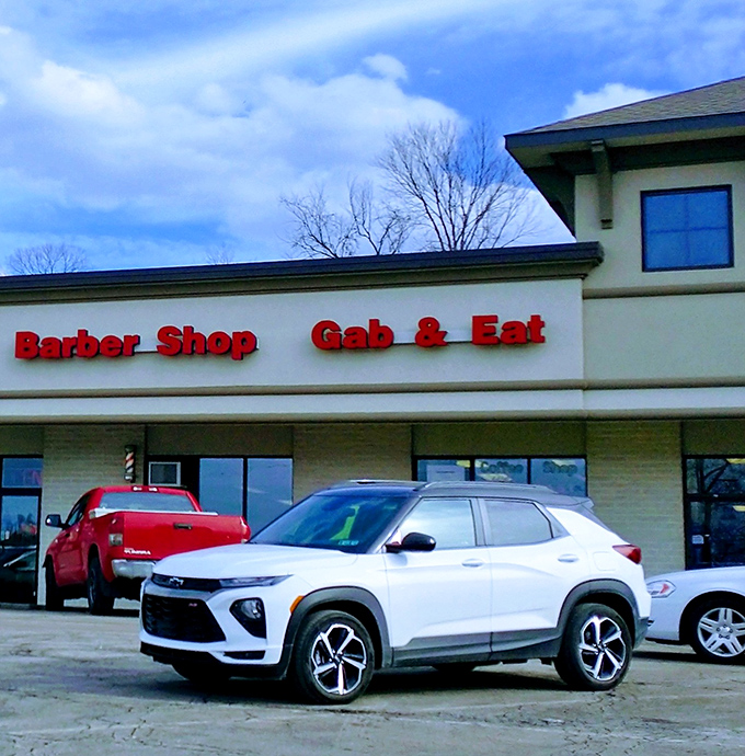 The red letters of Gab & Eat shine like a beacon of breakfast hope, conveniently located next to a barber shop&mdash;get your eggs and a haircut in one trip! 