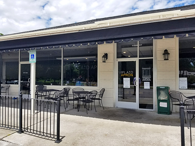 The unassuming exterior of The Plaid Apron belies the culinary magic happening inside. Like finding a secret clubhouse for breakfast enthusiasts.