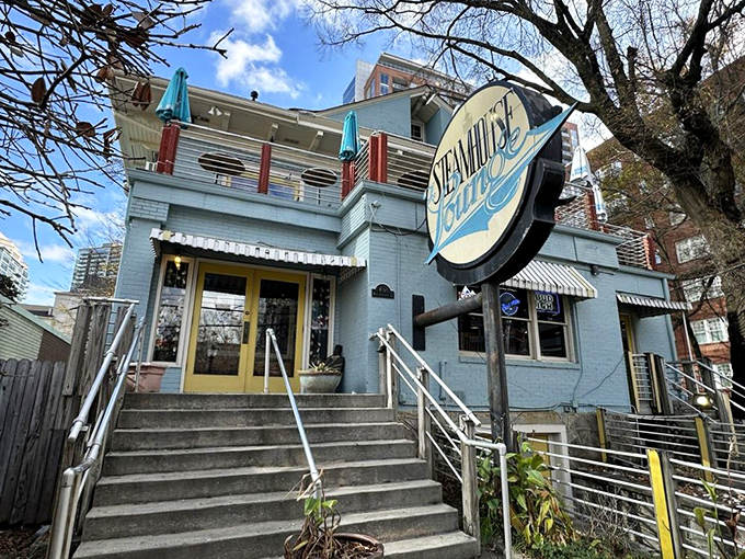 The little blue building that could. Nestled among Atlanta's skyscrapers, Steamhouse Lounge's charming exterior promises seafood treasures within those modest walls.