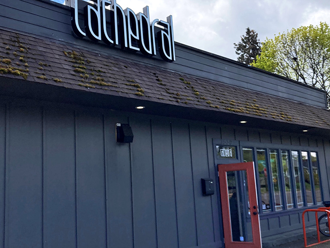 The blue-trimmed storefront with its glowing "OPEN" sign isn't just inviting&mdash;it's practically whispering sweet caffeinated promises to passersby.