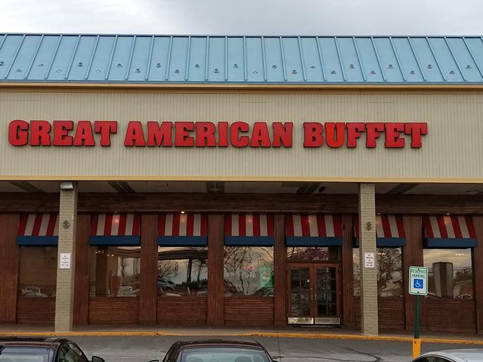 The red letters beckon like a lighthouse for the hungry. Great American Buffet's exterior promises what we all secretly want: permission to try everything on the menu.