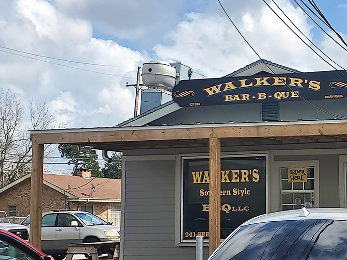 Walker's BBQ stands like a smoke-scented beacon of hope for hungry travelers. That massive smoker isn't just equipment&mdash;it's a declaration of serious barbecue intentions.