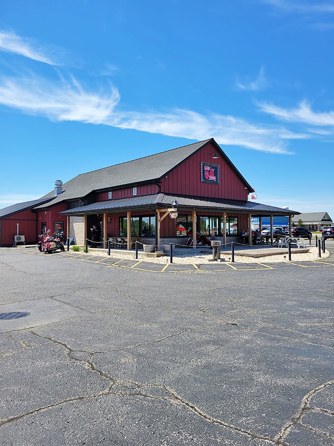 The red barn exterior isn't just rural Wisconsin charm—it's a smoke signal to barbecue pilgrims that they've reached the promised land.