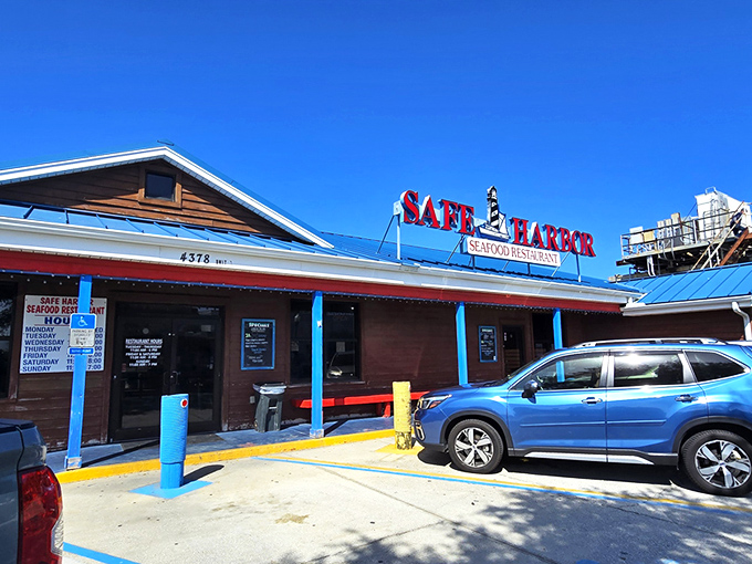 The unassuming exterior of Safe Harbor belies the seafood treasures within. That metal roof has weathered more Florida storms than a weatherman's hairpiece.