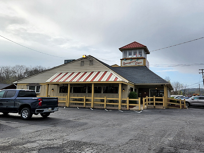 The lighthouse-inspired cupola atop Smuggler's Cove beckons hungry travelers like a beacon of seafood salvation in the Pocono Mountains. 