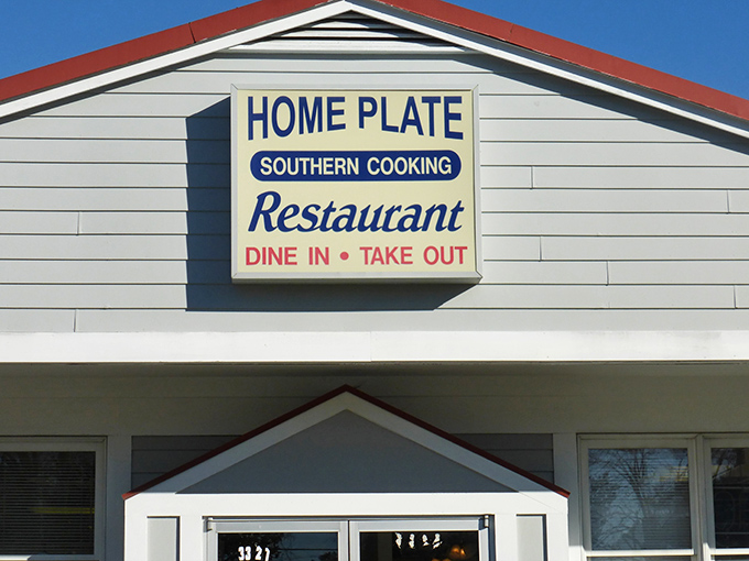 The modest white exterior with its simple sign says everything you need to know: no gimmicks, just honest Southern cooking that keeps locals coming back.
