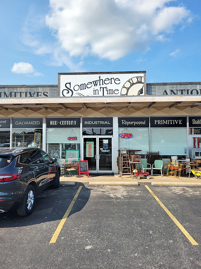 The unassuming storefront of Somewhere In Time beckons with promises of "PRIMITIVES" and "ANTIQUES" &ndash; a time portal disguised as a strip mall tenant.
