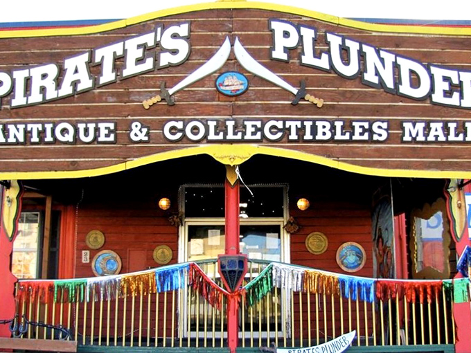 The exterior screams "adventure awaits!" with its wooden ship-styled sign and bright red building. Newport's most colorful treasure hunt begins here. 